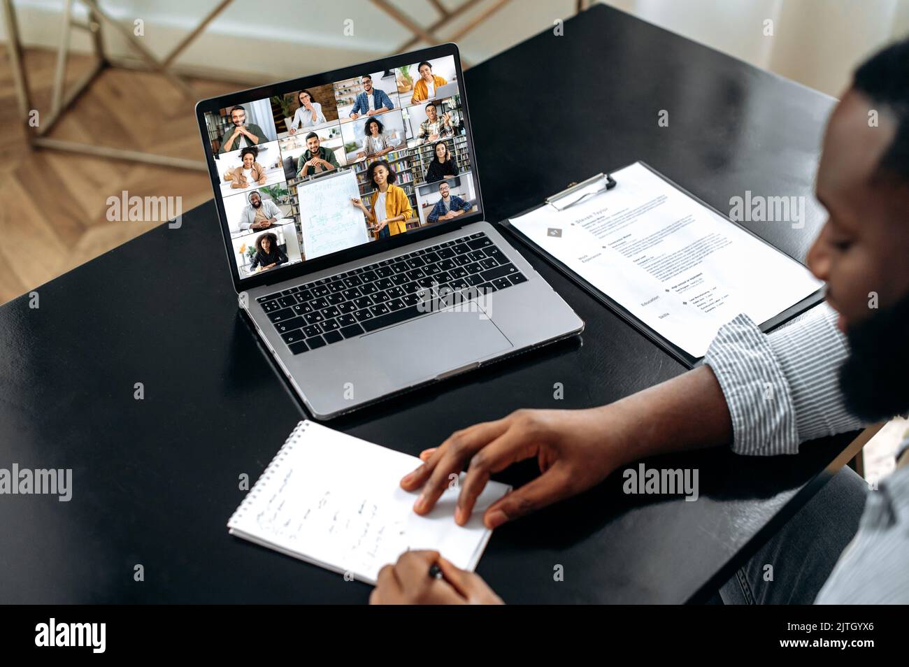 African american male smart student listening to the online lecture ...