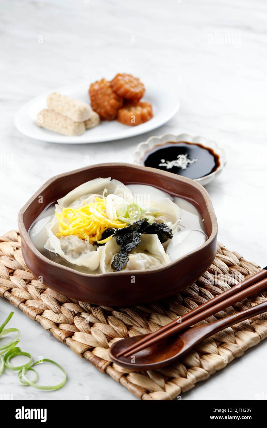 Korean Dumpling and Slice Rice Cake Soup Mandu Tteok Guk, Traditional ...