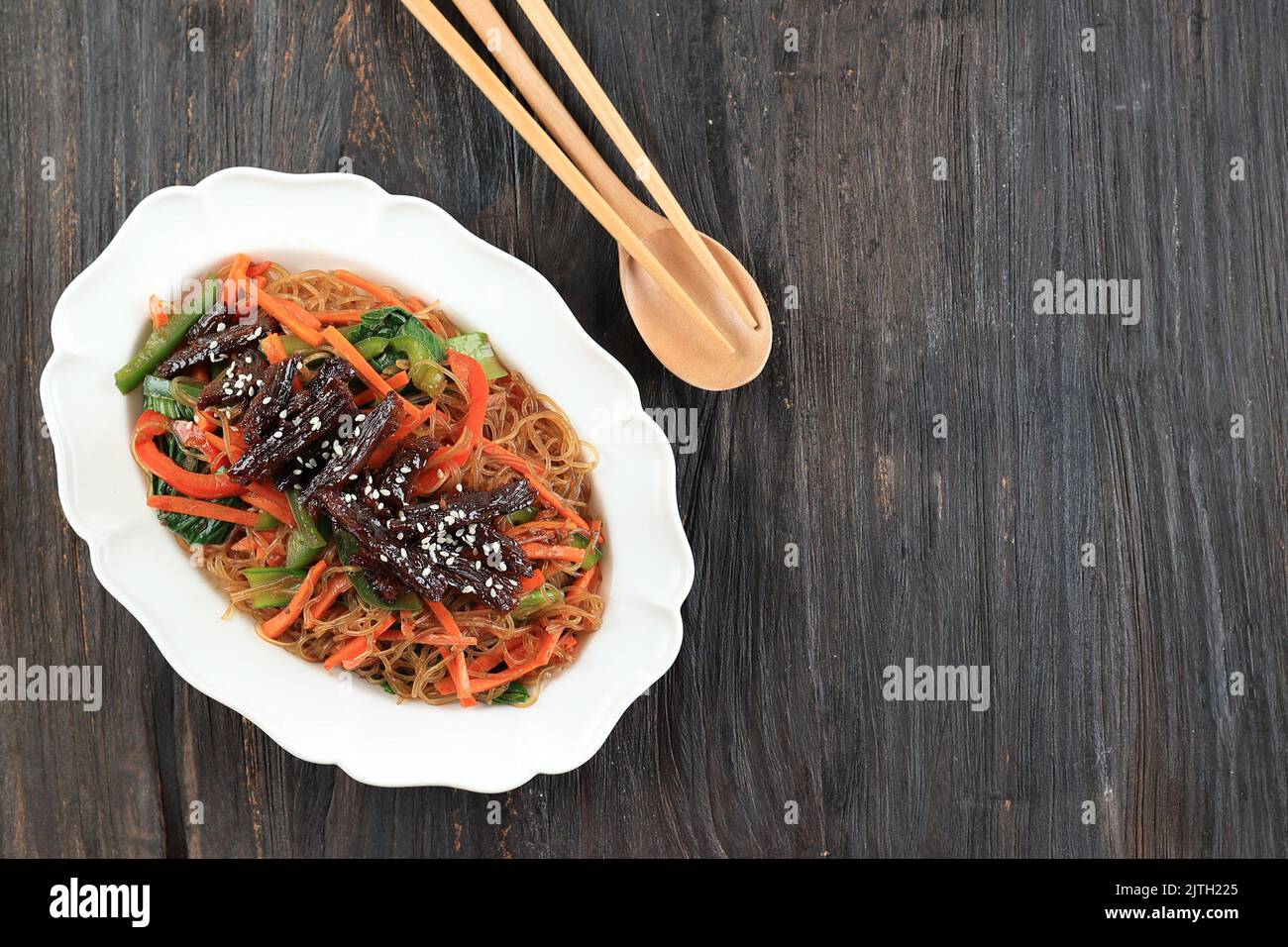 Japchae, Glass Noodles Stir Fried with Vegetables and Beef, Served on ...