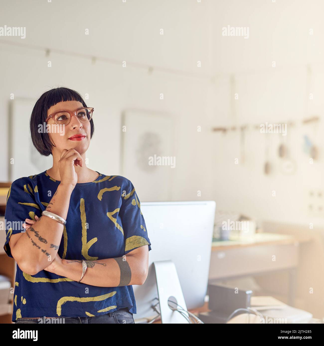 Letting her creativity shine. a stylish young designer standing in her ...