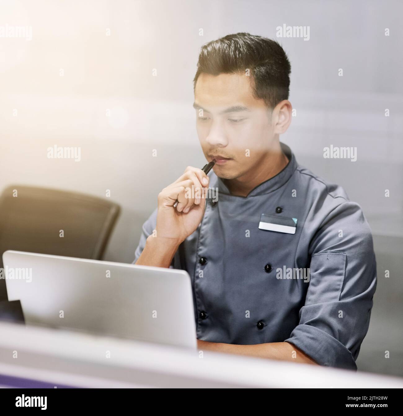 Chef with a laptop computer hi-res stock photography and images - Alamy