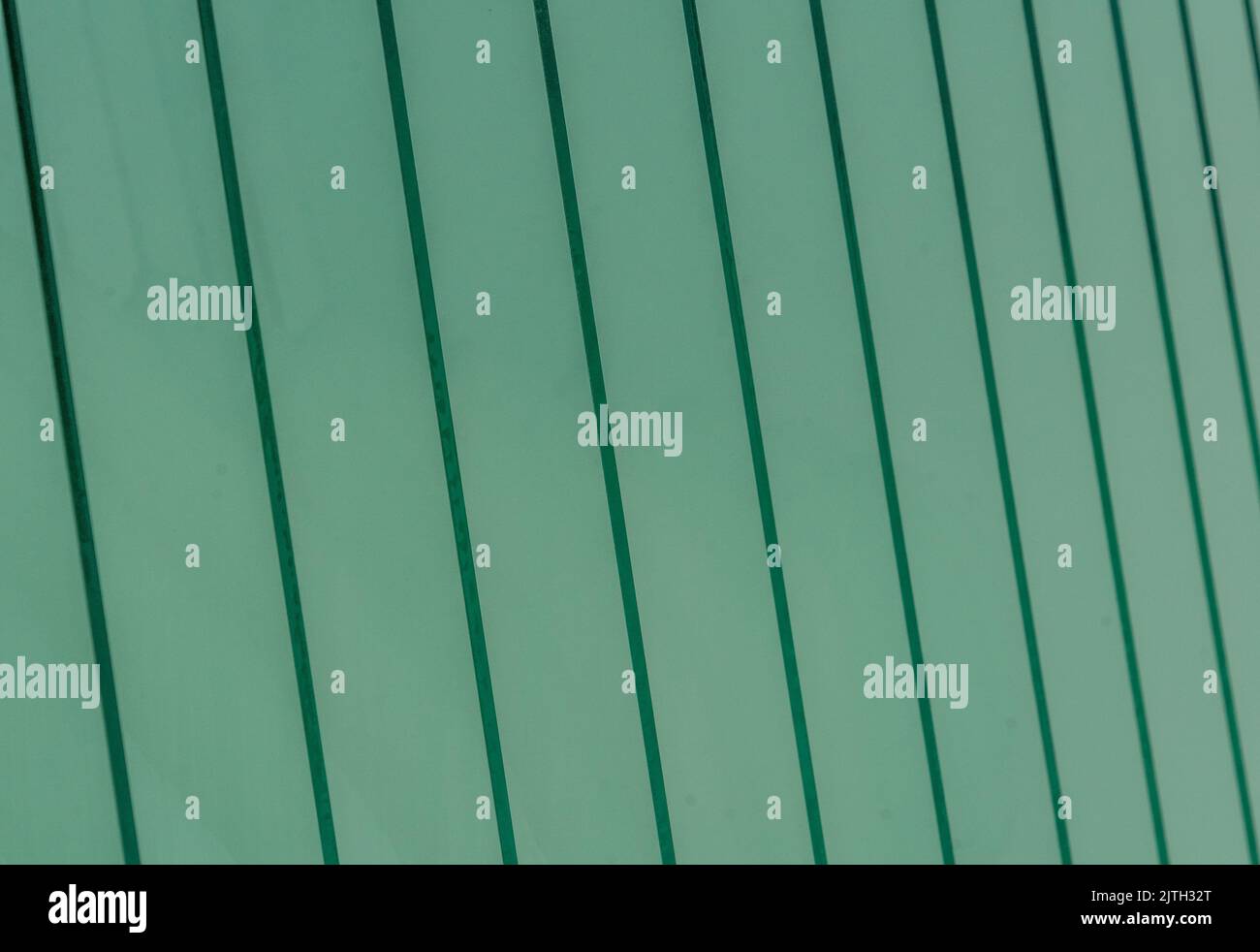 Leaning stack of commercial float glass panels Stock Photo - Alamy