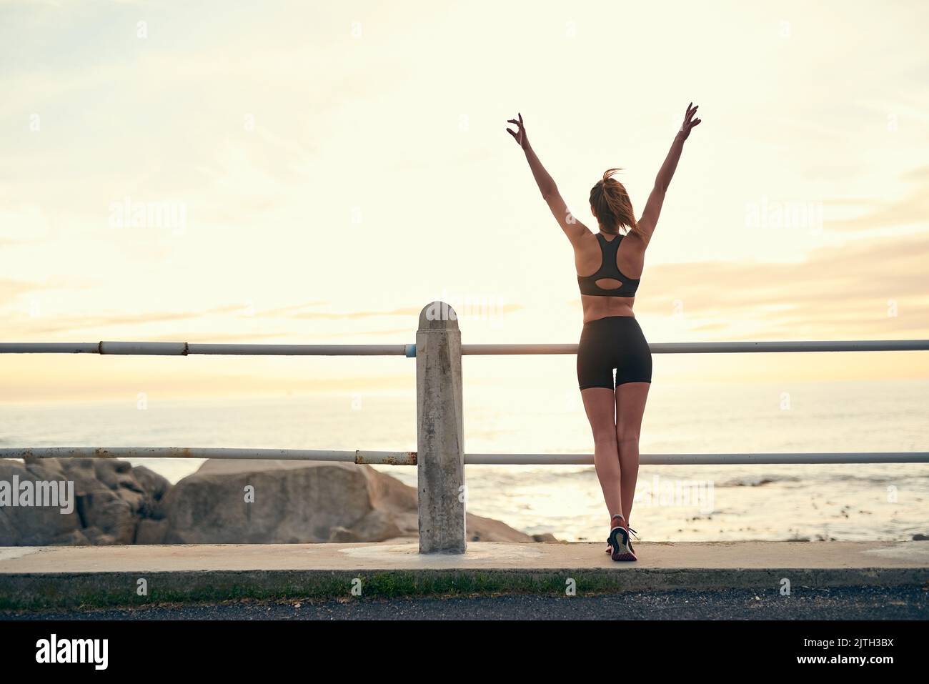 Success is a product of effort. a young sporty woman running outside ...