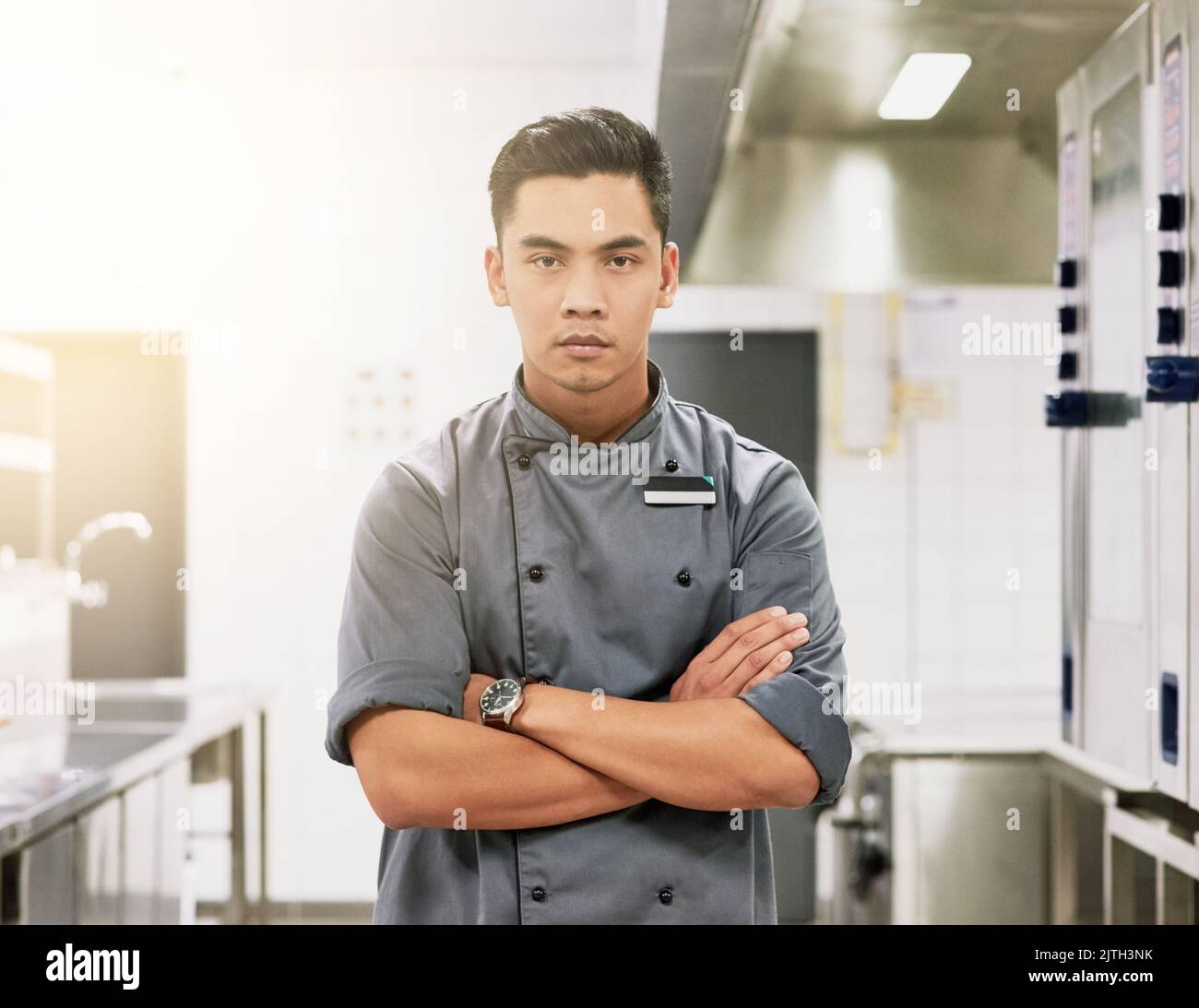 Im confident I can cook you up something special. Cropped portrait of a ...