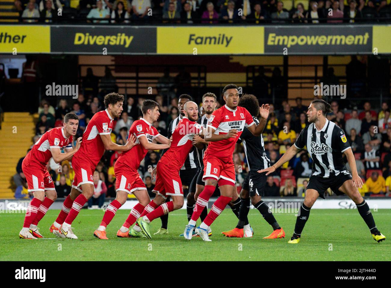 Watford, UK. 30th Aug, 2022. Middlesbrough corner kick team jostle for ...