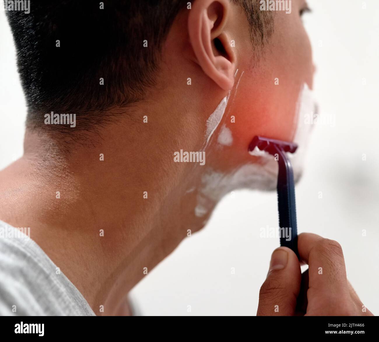 All I want is a smooth shave. a young man at home getting razor burn on ...