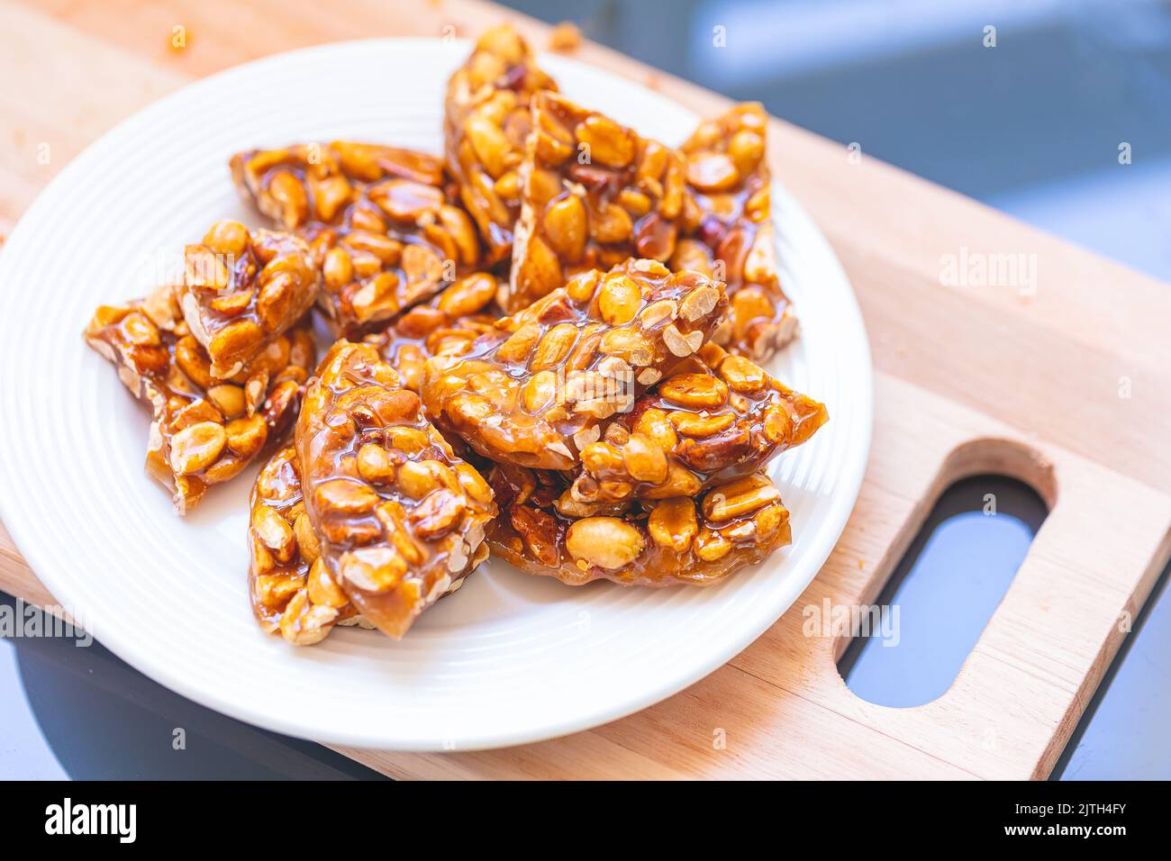 Brazilian peanut-based caramelized sweet that in Brazilian Portuguese ...