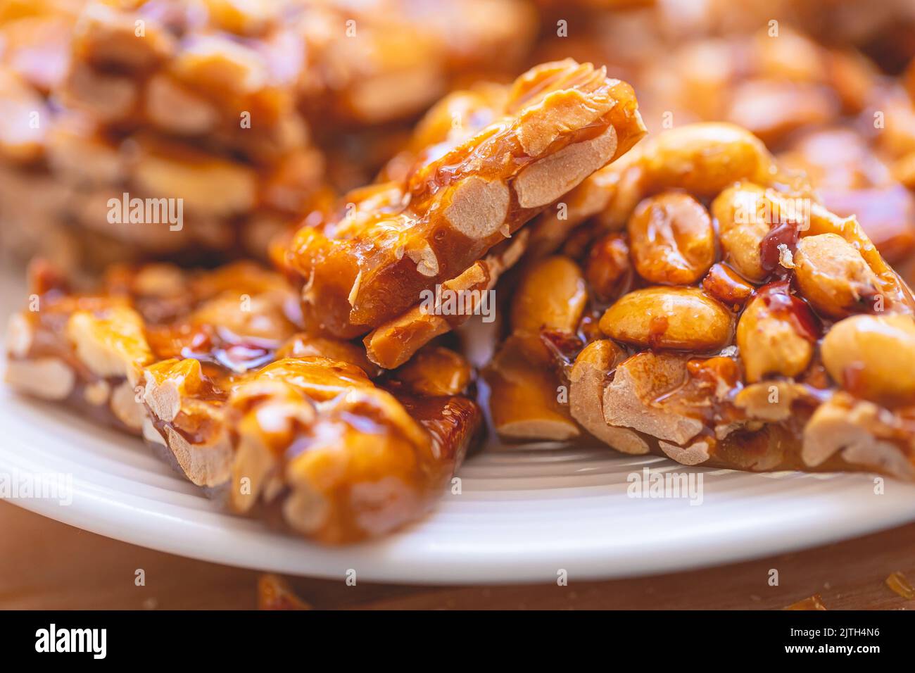 Brazilian peanut-based caramelized sweet that in Brazilian Portuguese ...