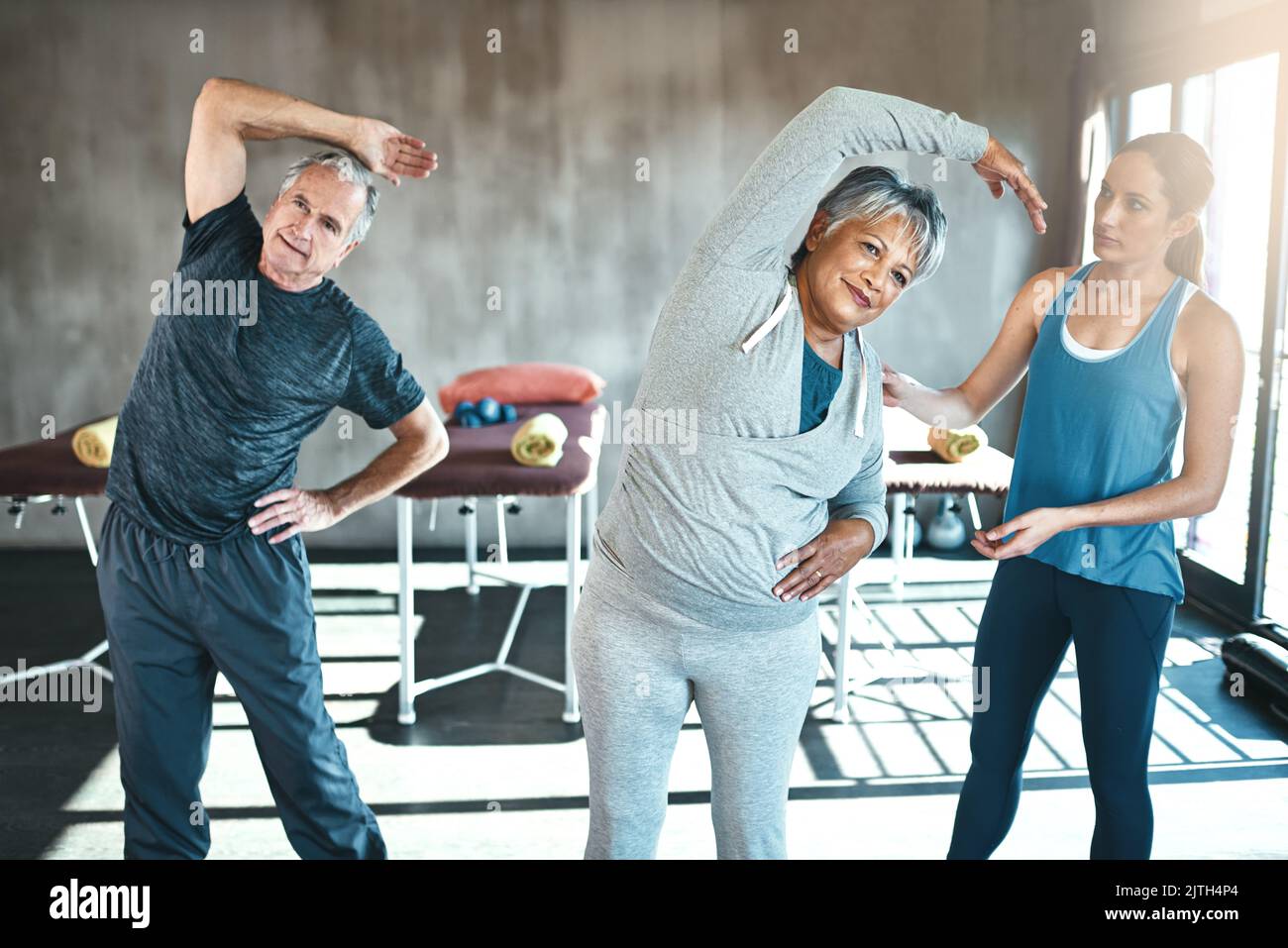 Activate a healthy retirement and join the gym. a senior man and woman ...