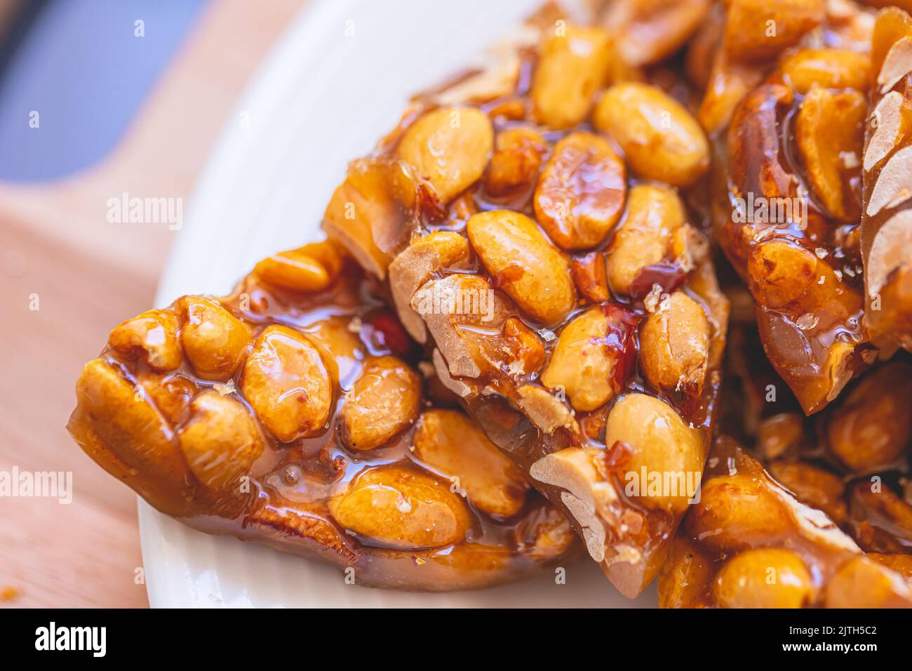 Brazilian peanut-based caramelized sweet that in Brazilian Portuguese ...