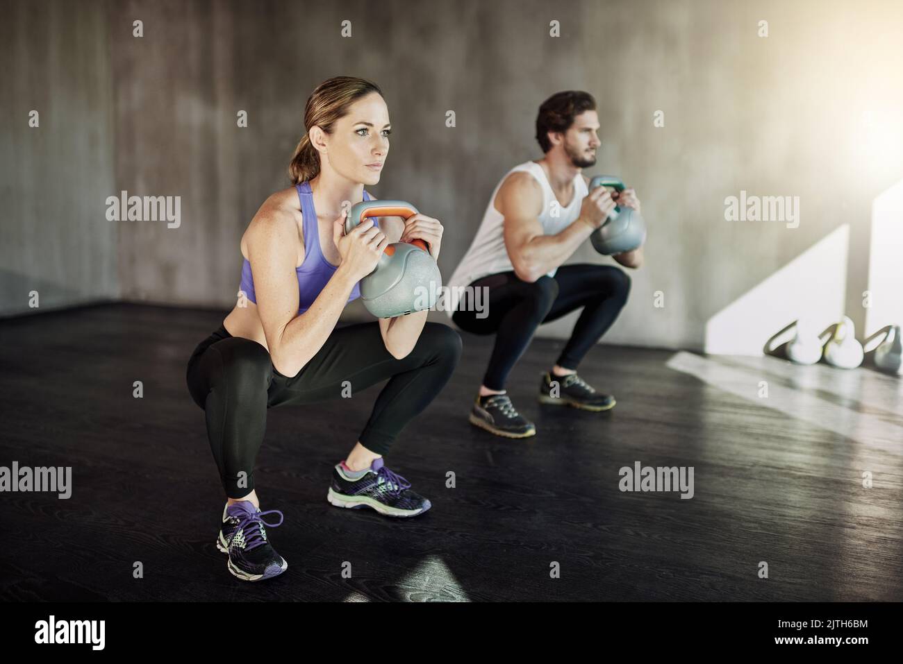 The difference between good and great is one more rep. two young people ...