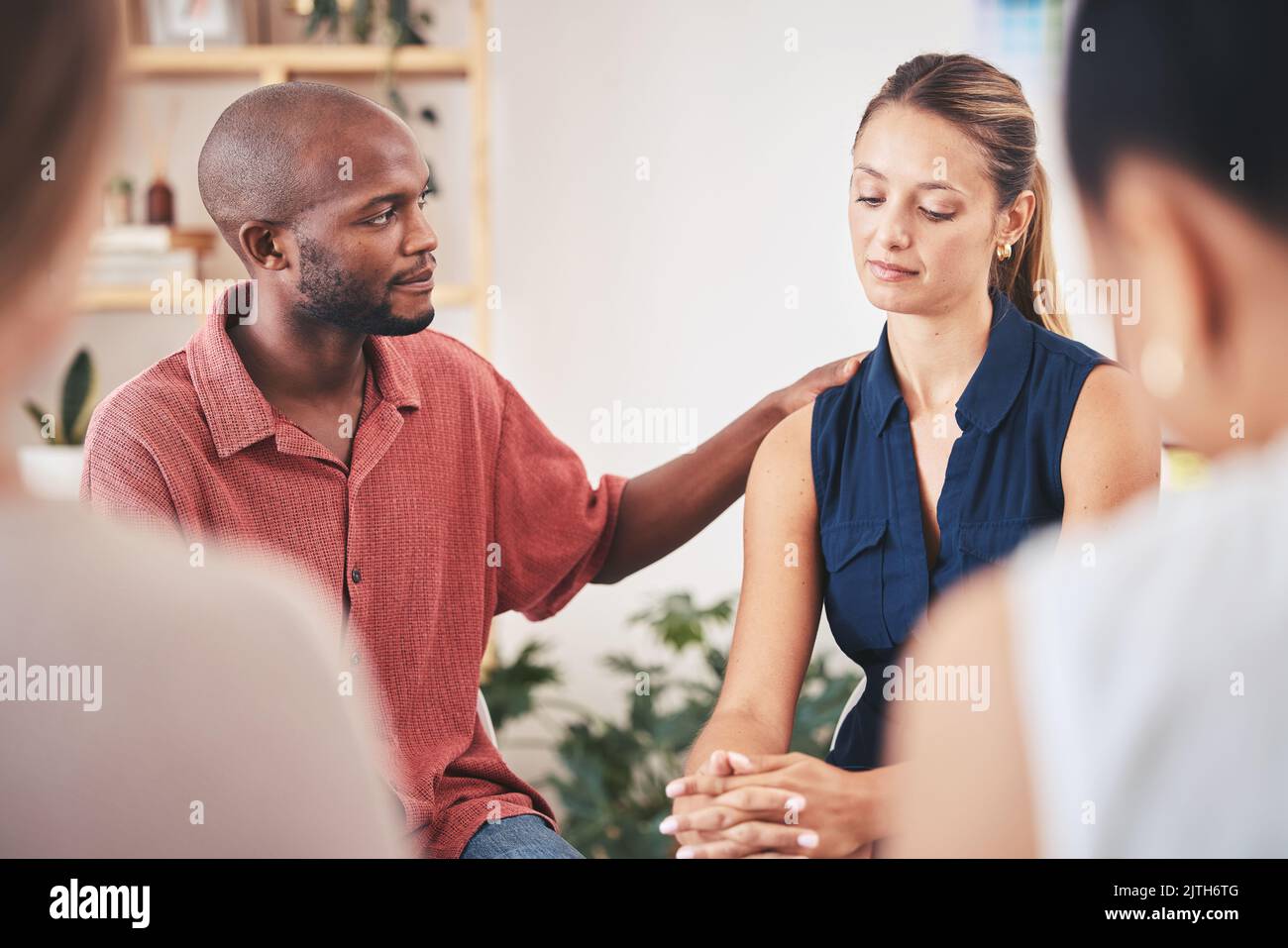 Support, comfort and console member in a therapy team meeting or ...