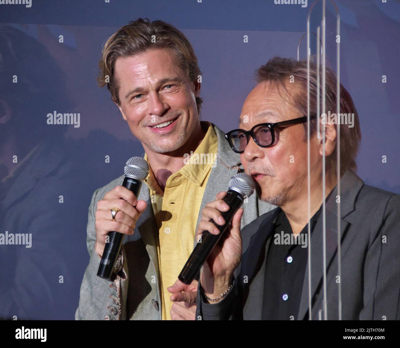 Japanese voice actor Kenyu Horiuchi and actor Brad Pitt attend the ...