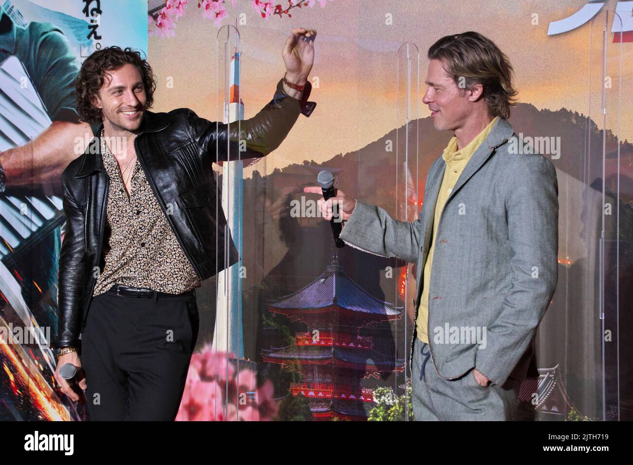 Actor Aaron Taylor-Johnson and Brad Pitt attend the stage greeting for ...