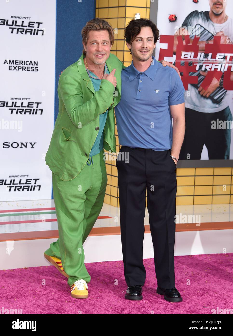 Brad Pitt and Logan Lerman arriving at the Los Angeles premiere of ...