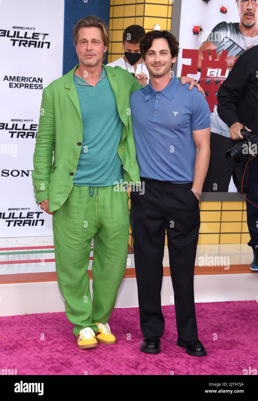 Brad Pitt and Logan Lerman arriving at the Los Angeles premiere of ...