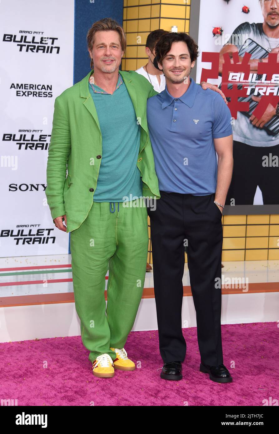 Brad Pitt and Logan Lerman arriving at the Los Angeles premiere of ...