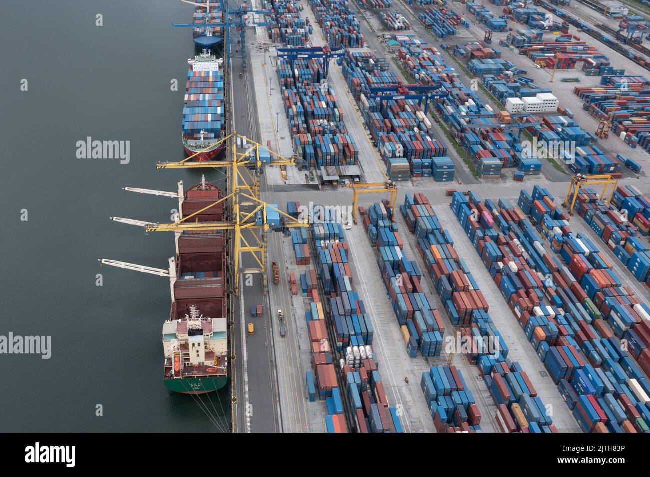 Nakhodka, Russia - August 5, 2022: Stacks of containers and sea ships ...