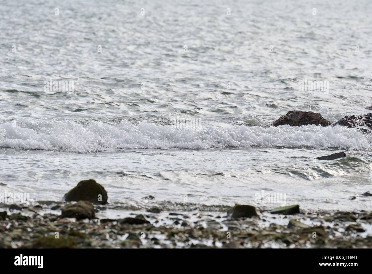A beautiful sea waves washing the rocky shore in Pok Fu Lam, Hong Kong ...