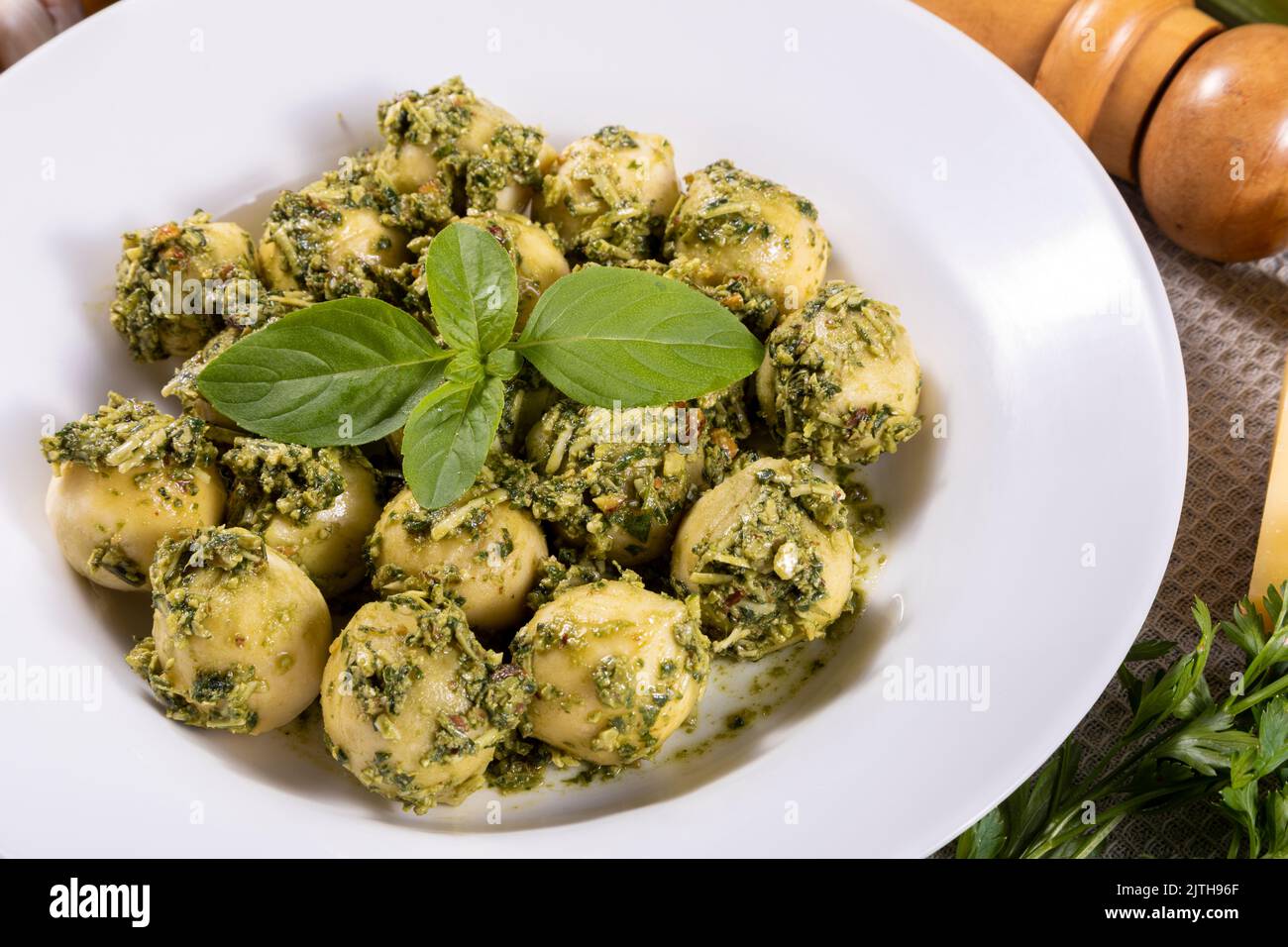 Potato gnocchi with pesto sauce Stock Photo - Alamy