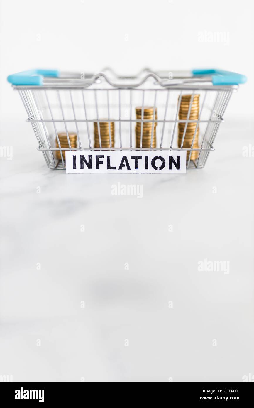 prices going up and rising inflation concept with text in front of ...