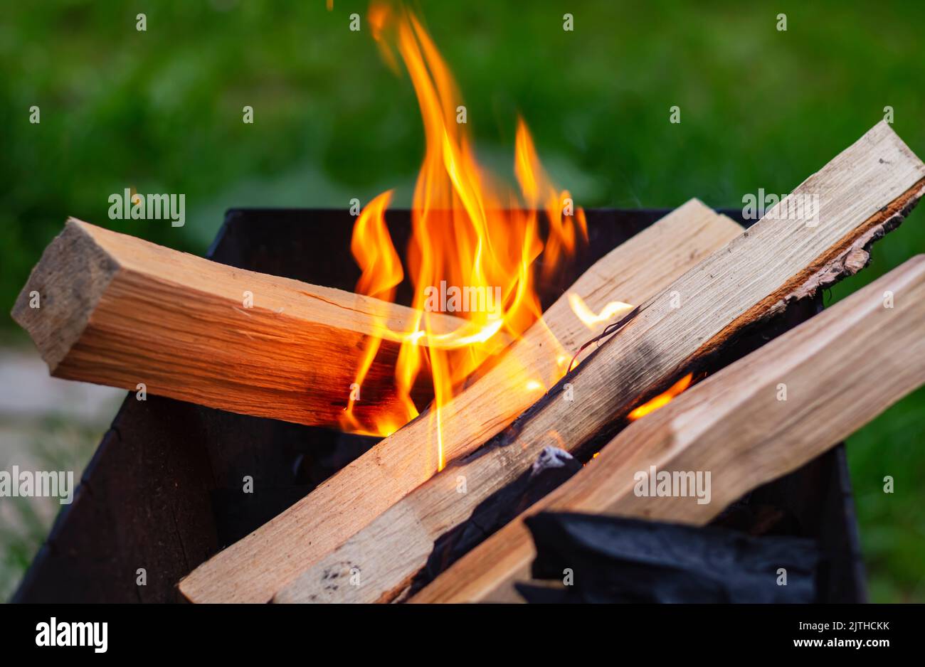 Preparation of embers for preparing of appetizing barbecue on grill on ...