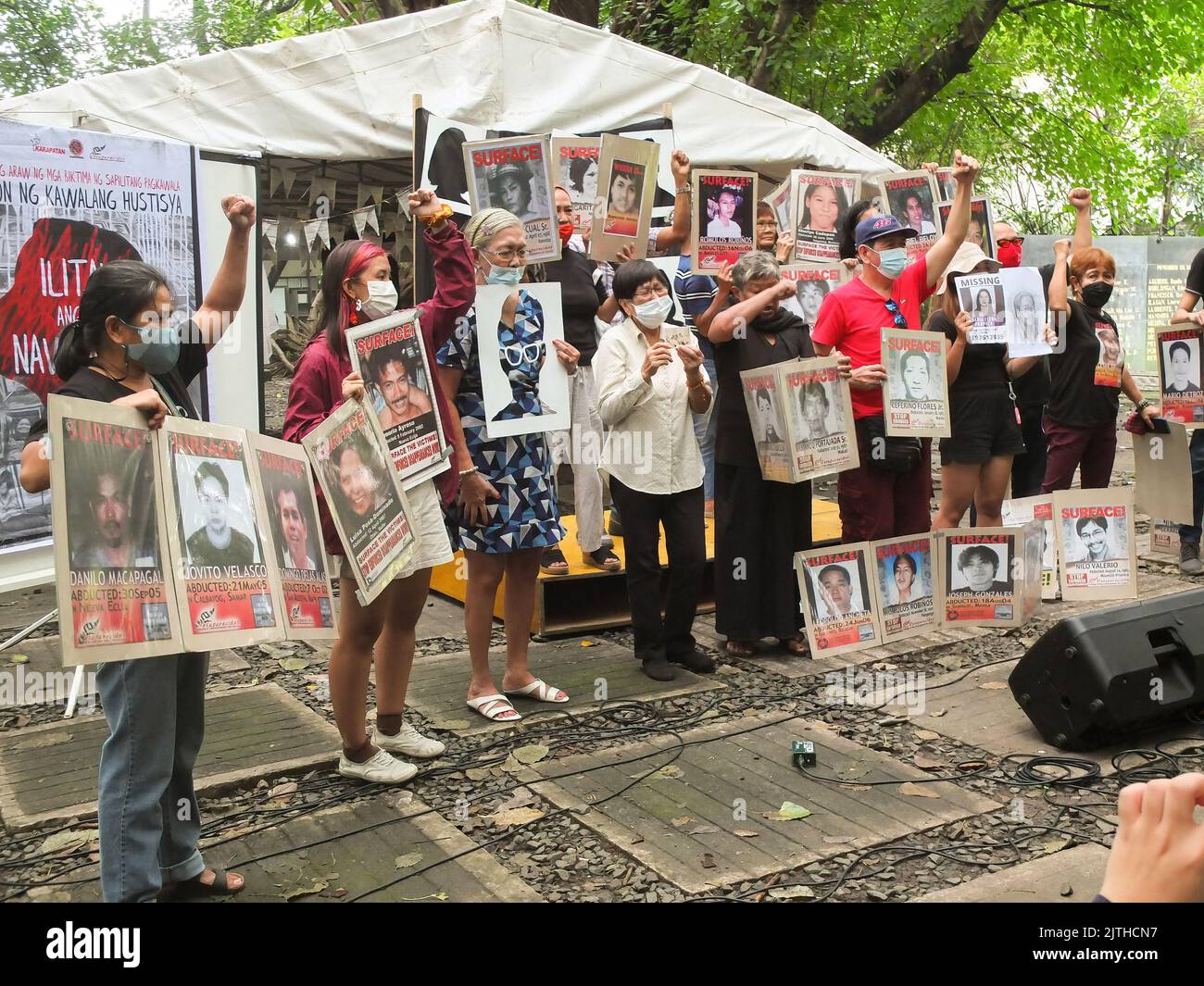 Quezon, Philippines. 30th Aug, 2022. The Kins of desaparecidos raising ...