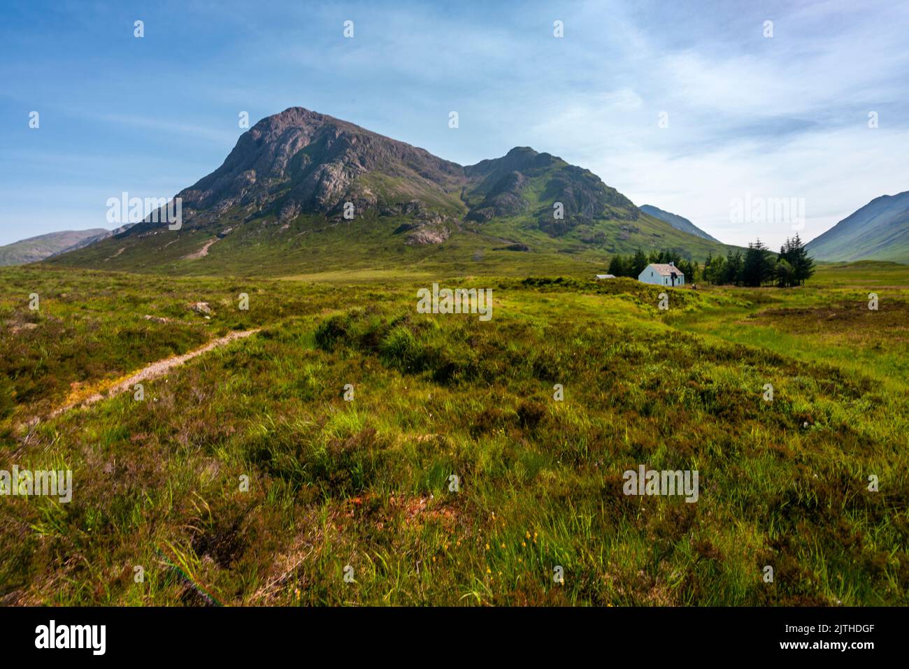 The iconic little white hut nestles in the valley beneath Buachaille ...
