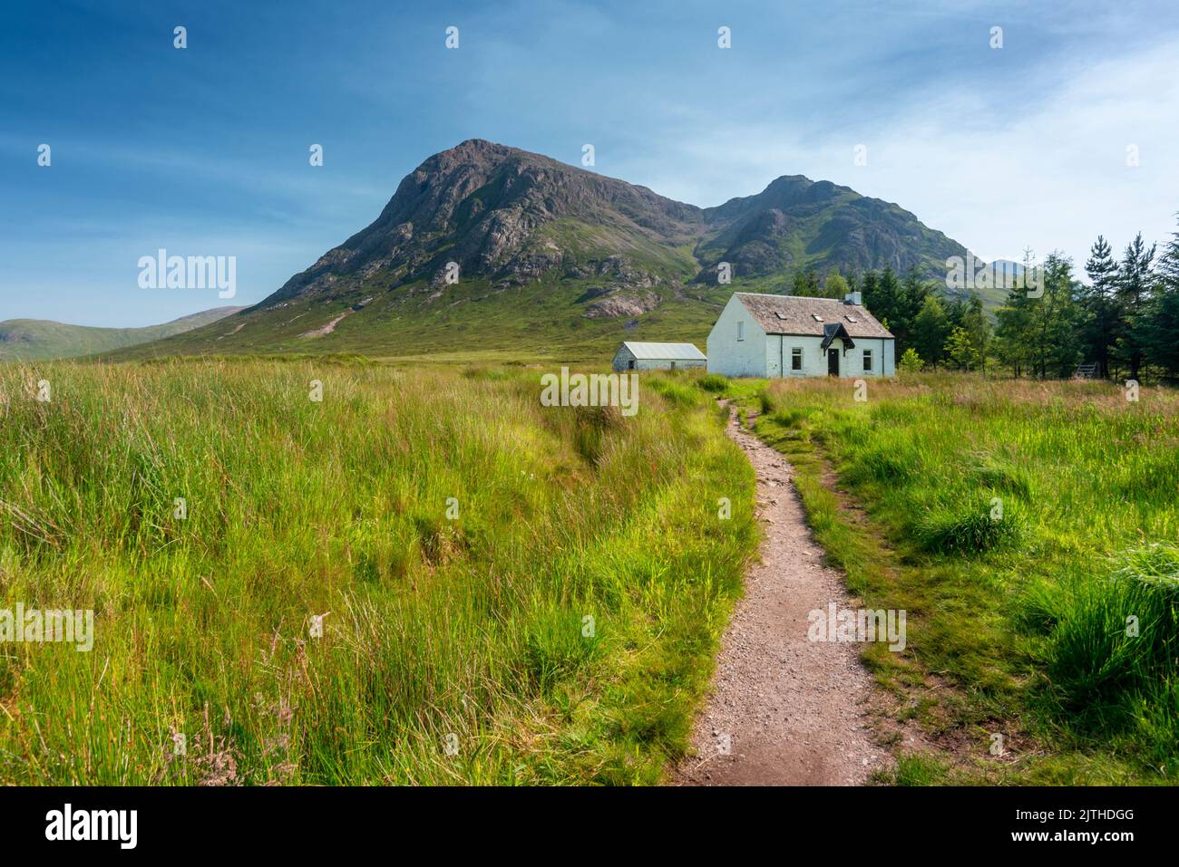The iconic little white hut nestles in the valley beneath Buachaille ...