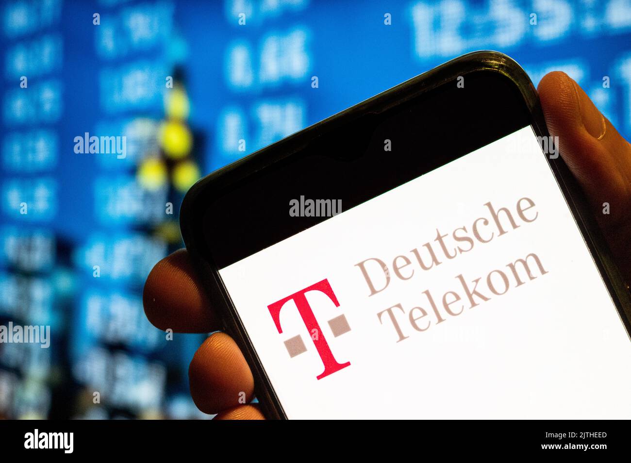 In this photo illustration, the German telecommunications company ...