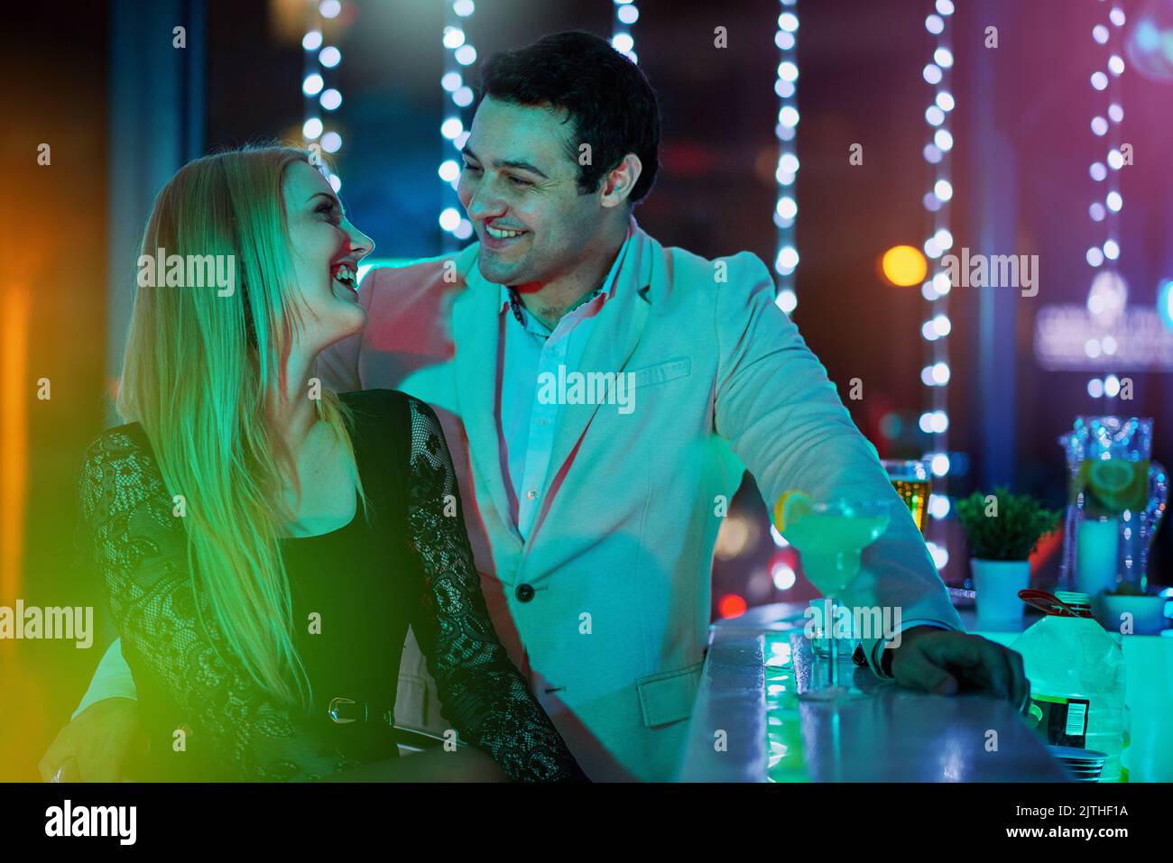 Couple chatting at the bar hi-res stock photography and images - Alamy