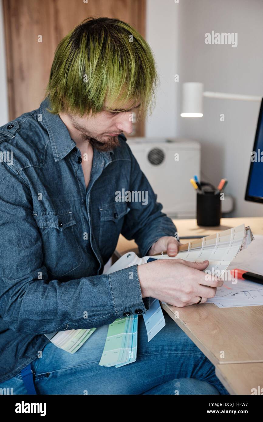 Architect select colors for building using color swatches, searching ...