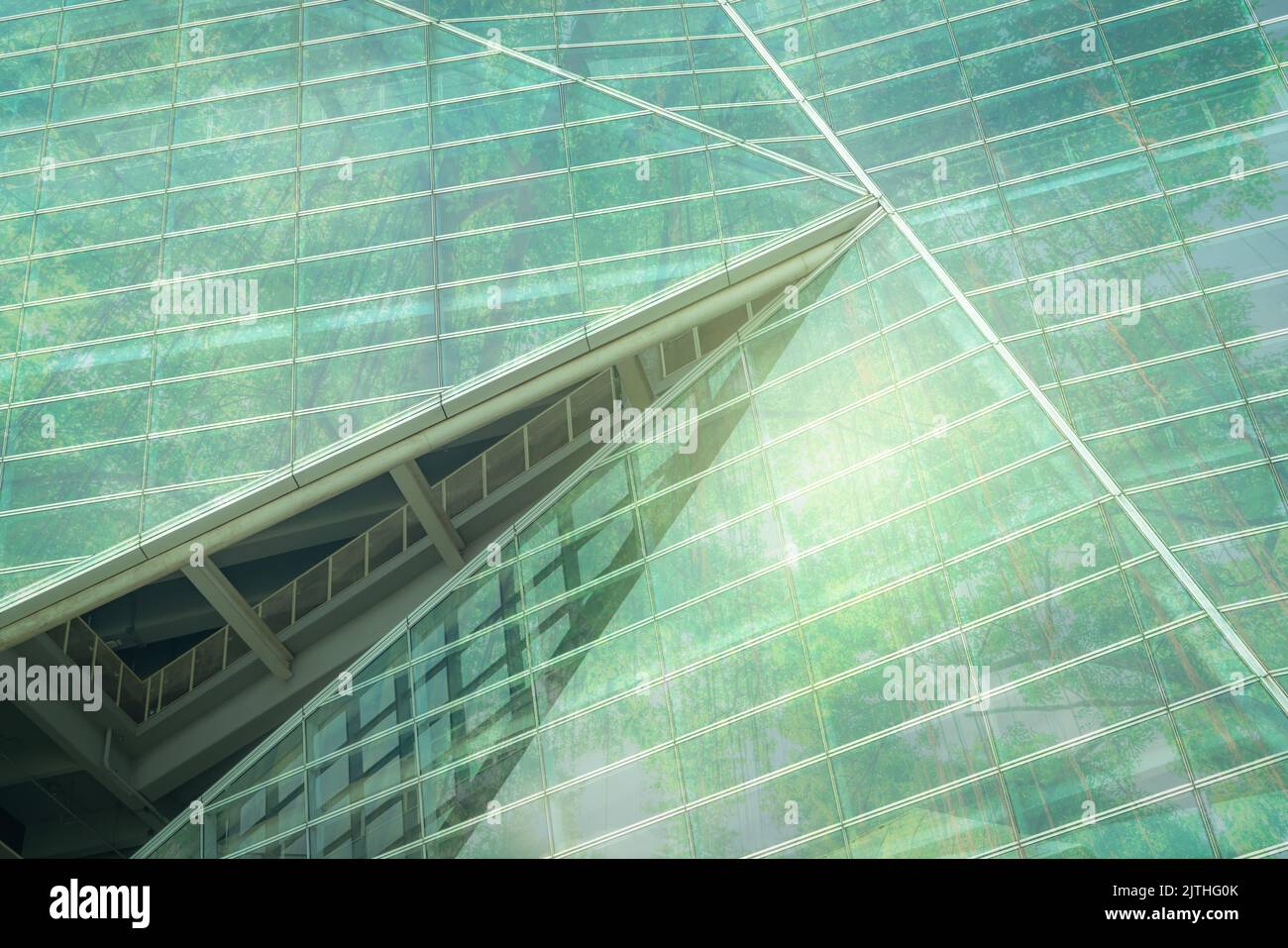 Sustainble green building. Eco-friendly building. Sustainable glass ...