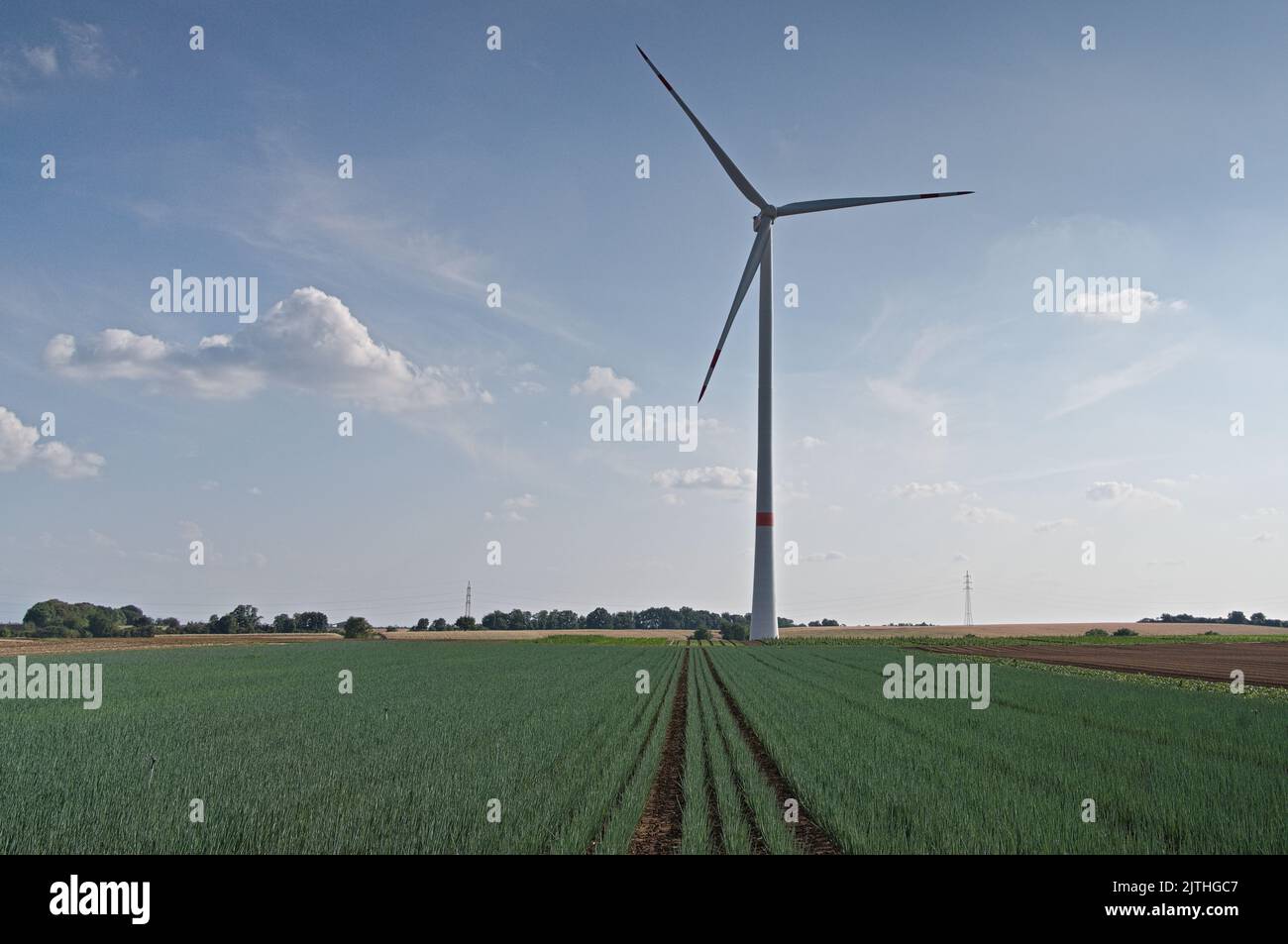 Single wind turbine in rural landscape Stock Photo - Alamy