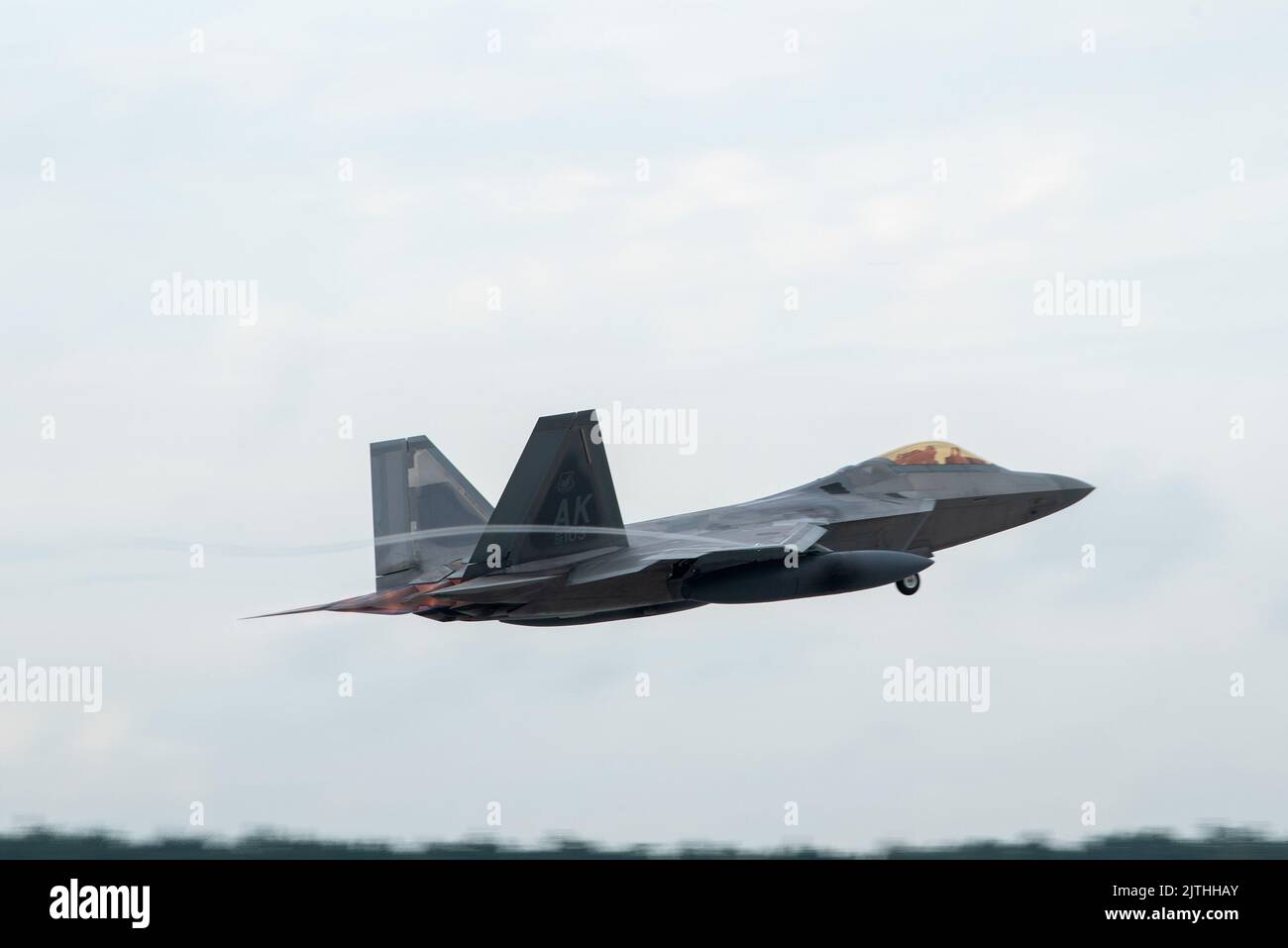 A U.S. Air Force F-22 Raptor assigned to the 90th Expeditionary Fighter ...