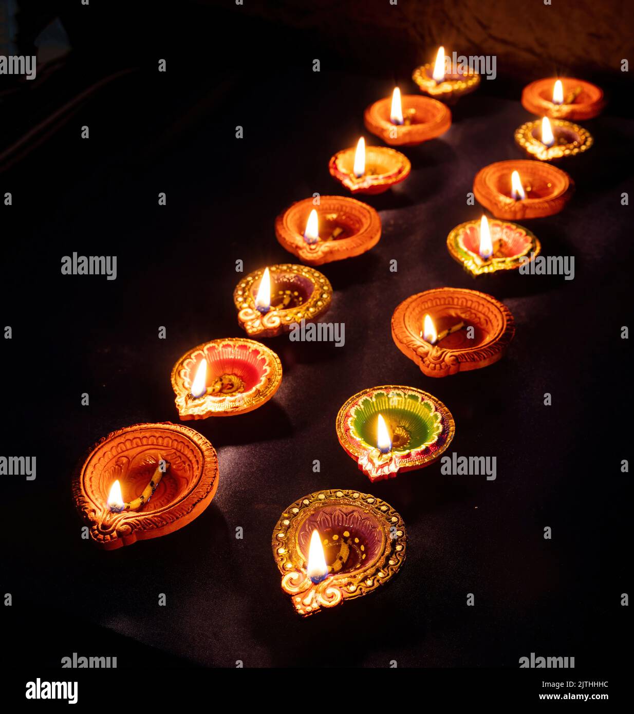 Diwali. Deepavali Hindu festival of lights. Clay diya candles in rows ...
