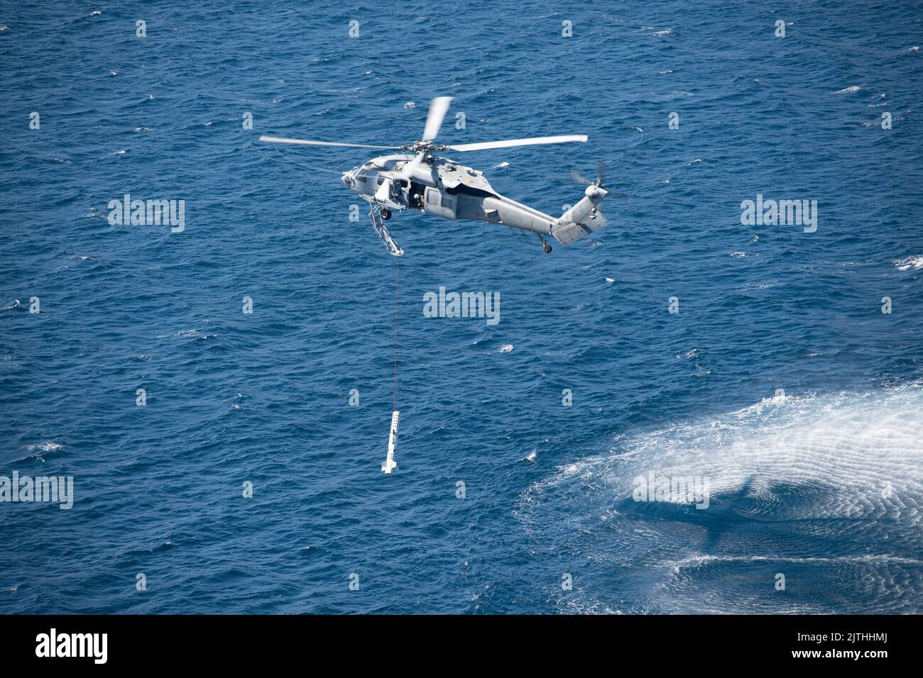 An MH-60S Sea Hawk attached to Helicopter Sea Combat Squadron (HSC) 21 ...