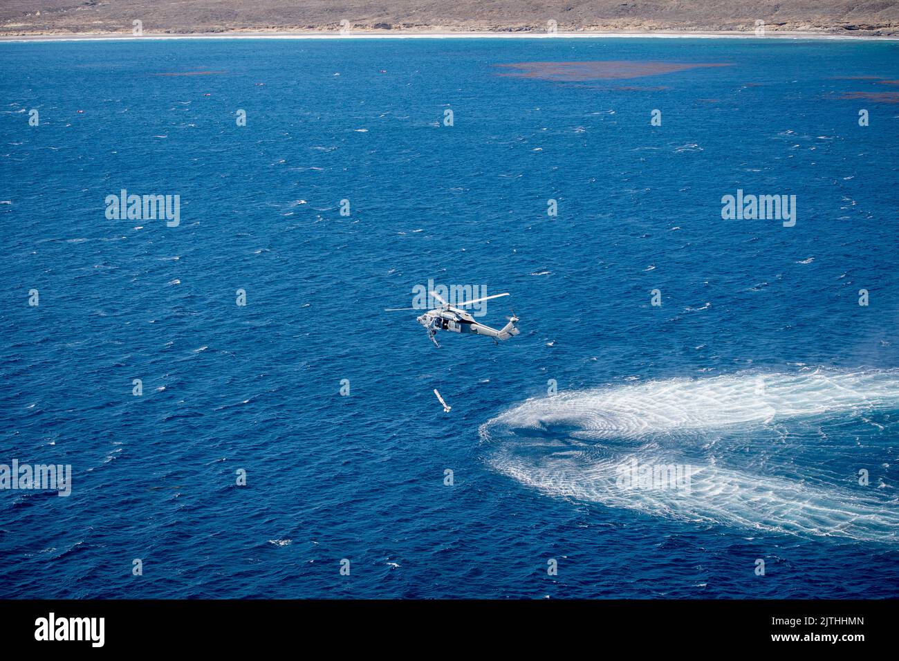 An MH-60S Sea Hawk attached to Helicopter Sea Combat Squadron (HSC) 21 ...