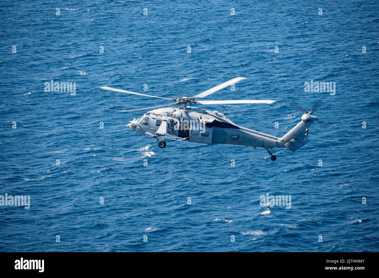 An MH-60S Sea Hawk attached to Helicopter Sea Combat Squadron (HSC) 21 ...