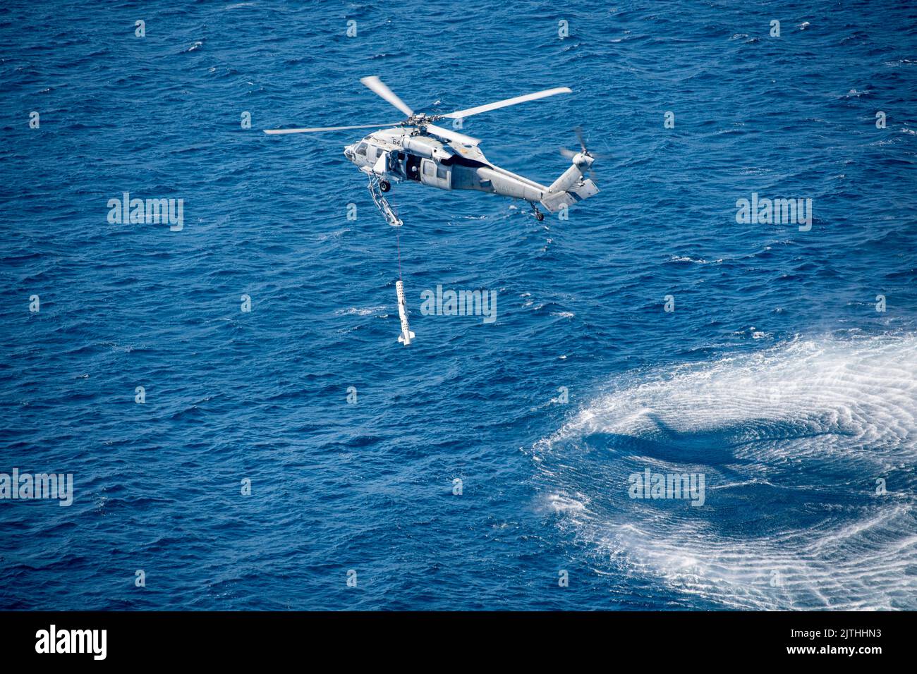 An MH-60S Sea Hawk attached to Helicopter Sea Combat Squadron (HSC) 21 ...