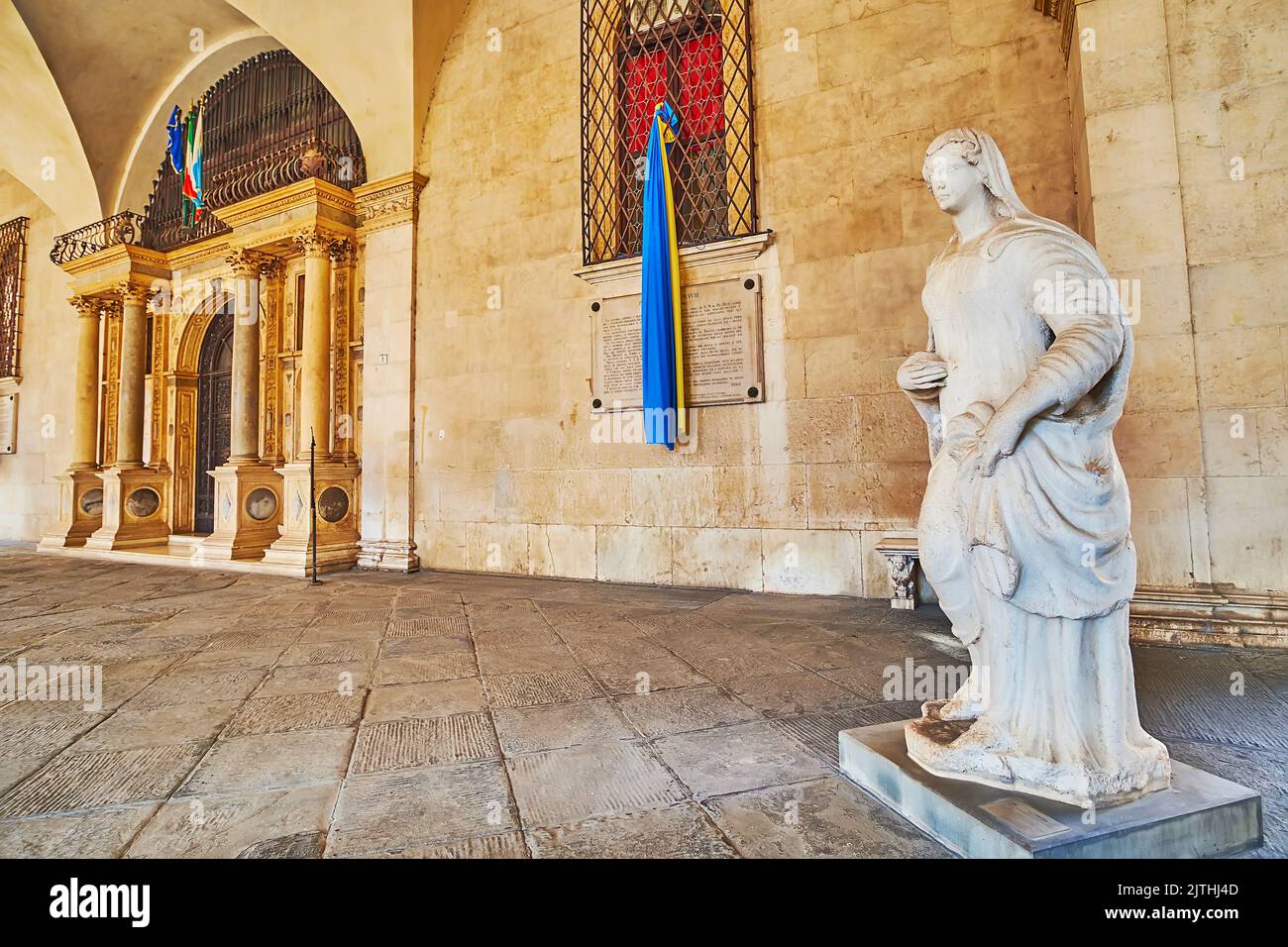 The ancient La Lodoiga statue in portico of Palazzo della Loggia ...