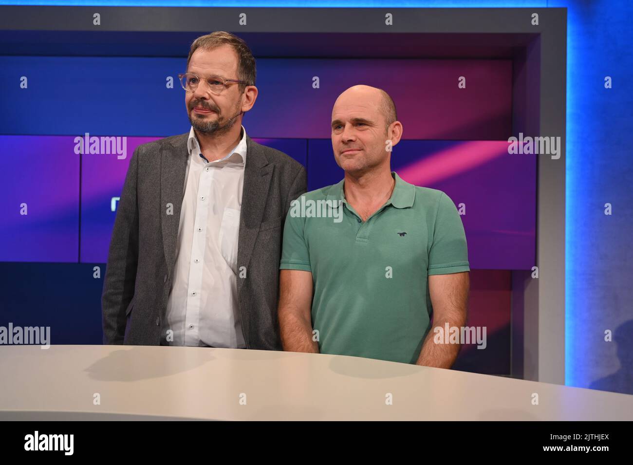 Cologne, Germany. 30th Aug, 2022. Sports journalist Hajo Seppelt, l-r ...