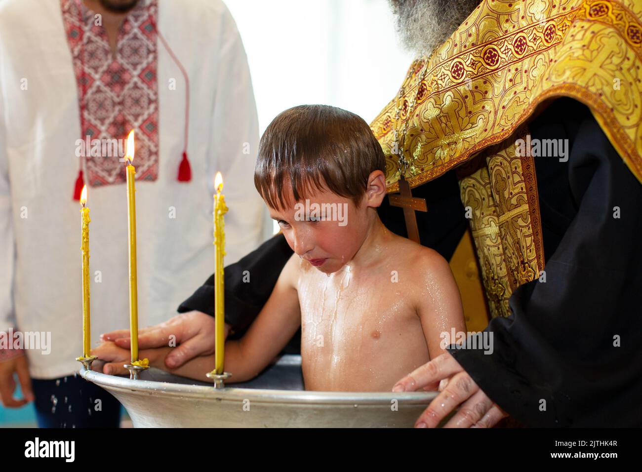 Orthodox baptism of a Belarusian child in a church Stock Photo - Alamy