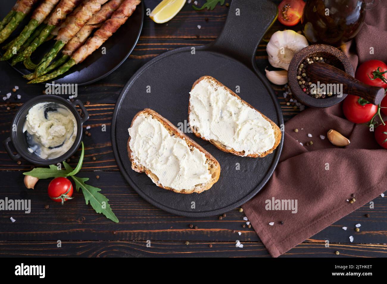 Tasty breakfast - toasts with cream cheese and Asparagus wrapped with ...