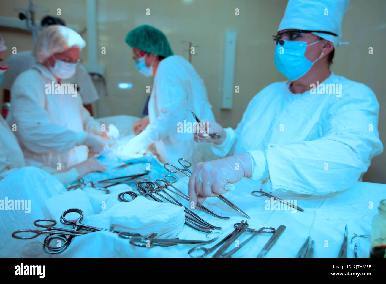 Surgeons during the operation. Professional doctors performing ...