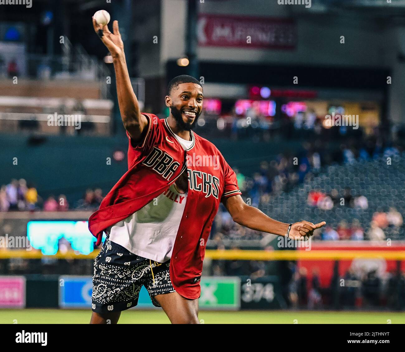 Phoenix Suns Mikal Bridges throws out the first pitch before an MLB ...