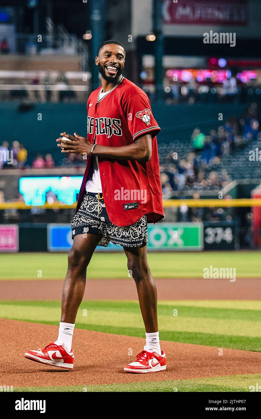 Phoenix Suns Mikal Bridges throws out the first pitch before an MLB ...