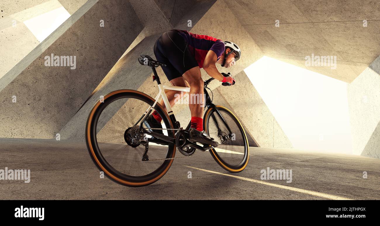 Portrait of man, professional cyclist training, riding on professional ...