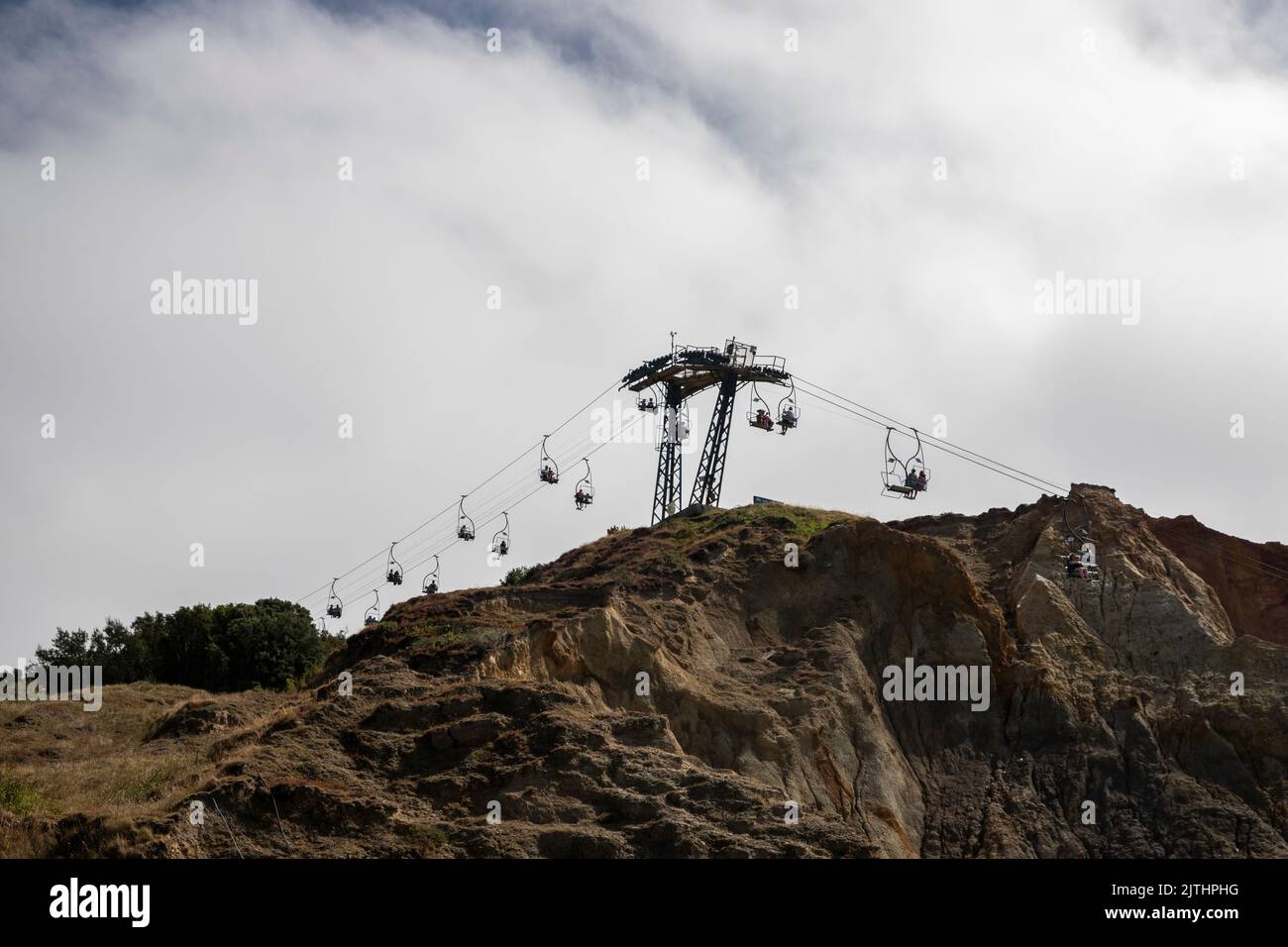 Silhouette view of the chairlift / cable cars at Alum Bay, near the ...