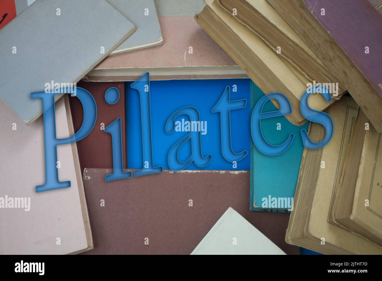 Pilates word in opened book with vintage, natural patterns old antique ...